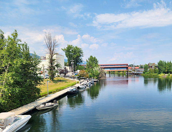 Sandpoint: Boats bob gently along the marina while mountains stand guard, creating Sandpoint's signature blend of adventure and tranquility.