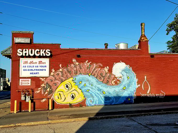 Shucks Fish House: The vibrant fish mural practically winks at passersby, promising ocean treasures in this landlocked oasis.