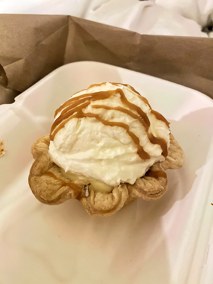Banana cream pie that would make your grandmother both proud and jealous. That caramel drizzle isn't just decoration&mdash;it's a flavor exclamation point!