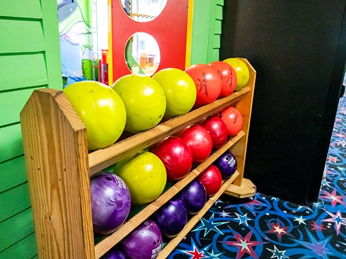 A rainbow of bowling balls awaits your selection &ndash; will you choose based on weight, finger fit, or simply because that purple one matches your shoes?