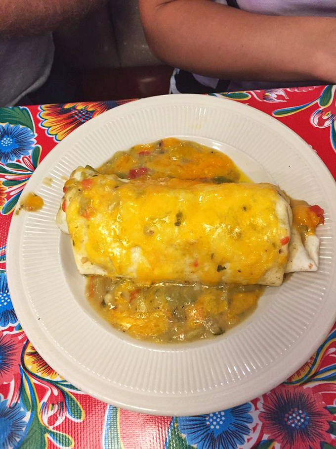 Cheese-blanketed breakfast perfection that makes you question why you'd eat anything else before noon. Morning salvation on a plate.