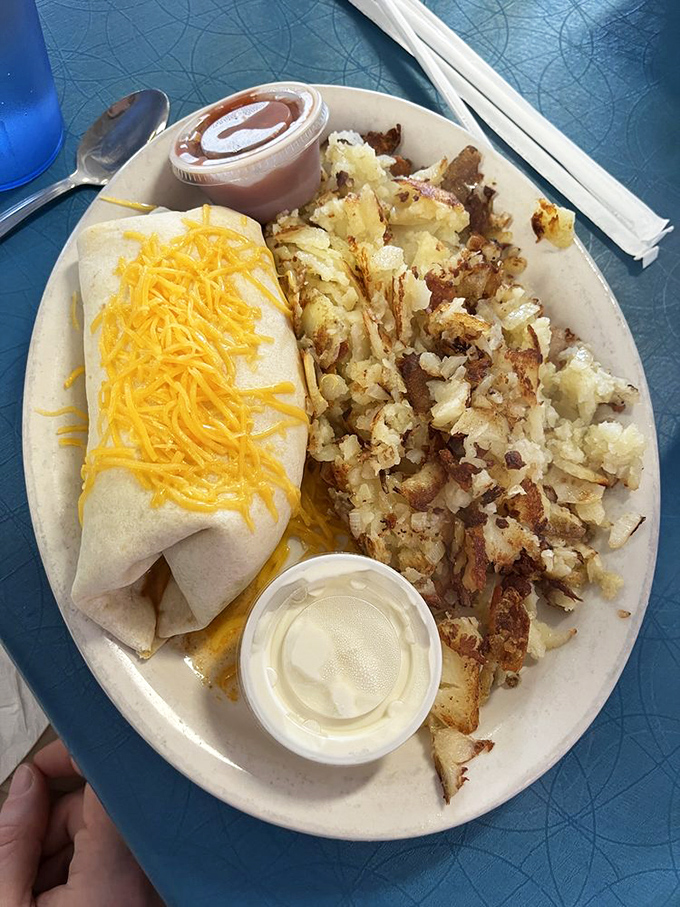 Breakfast burritos here don't need fancy wrapping&mdash;just cheese oozing out the sides and hash browns with the perfect crisp-to-tender ratio.