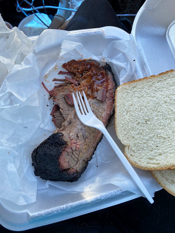 Behold the brisket in its natural habitat&mdash;bark-crusted, pink-ringed, and ready for its close-up. That slice has more character development than most Hollywood films.