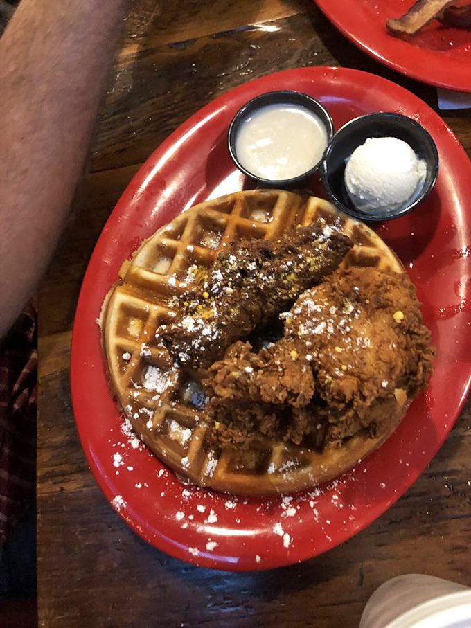 Chicken and waffles: where breakfast and dinner stop fighting and finally make peace. That powdered sugar dusting? The white flag of delicious surrender.