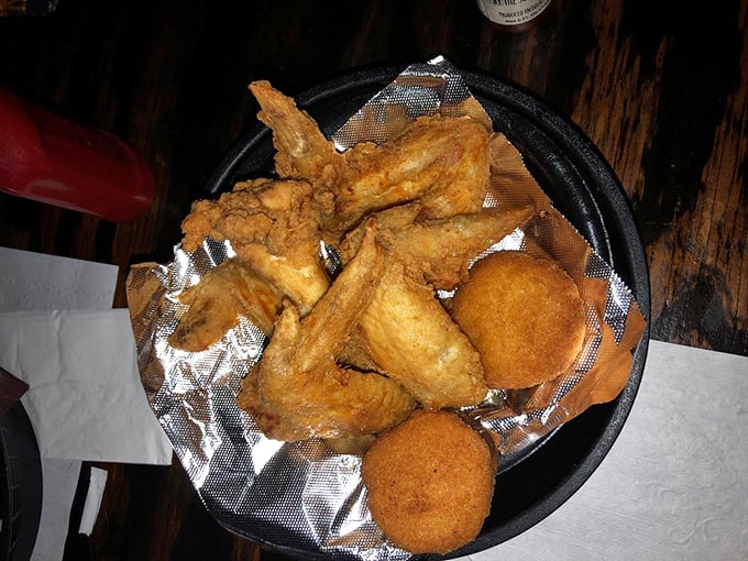 Golden-brown chicken wings that shatter with each bite, served unpretentiously on foil&mdash;because when food's this good, fancy plating would just get in the way.