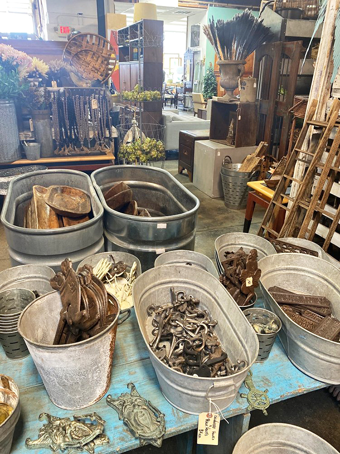 Galvanized tubs brimming with rusty treasures&mdash;where someone else's discarded hardware becomes your kitchen's industrial-chic conversation piece.