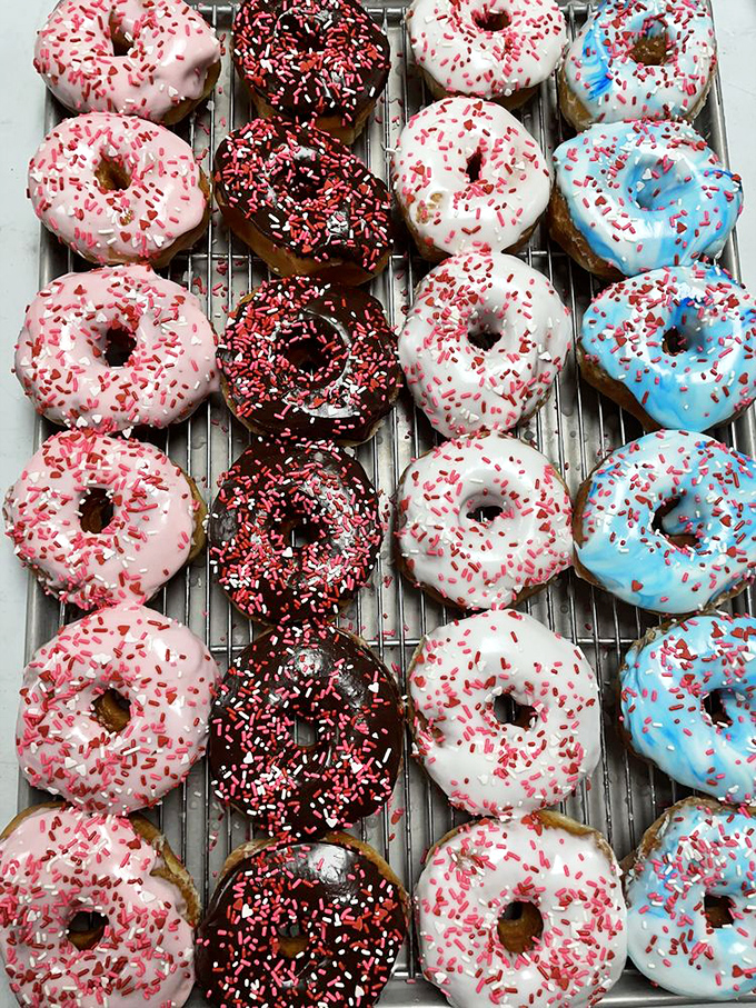 Glazed masterpieces lined up with military precision &ndash; these aren't just doughnuts, they're your reward for making it through Monday.