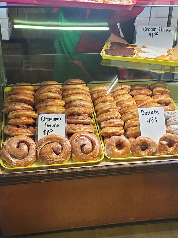 Cinnamon twists and glazed donuts lined up like edible soldiers, ready to march straight into your heart (and arteries).