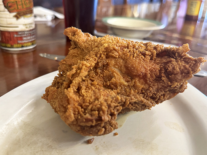 Golden-brown perfection that makes your taste buds stand at attention&mdash;this isn't just fried chicken, it's edible Southern poetry.