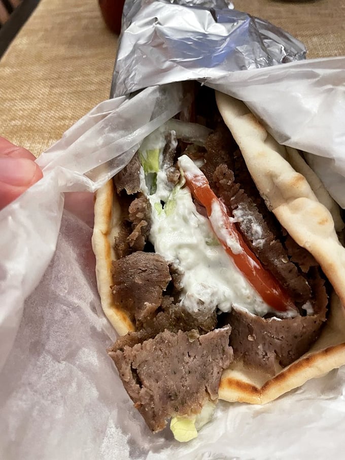 The star of the show unwrapped like a present. This gyro doesn't need fancy packaging&mdash;the meat, sauce, and veggies create the perfect trilogy.