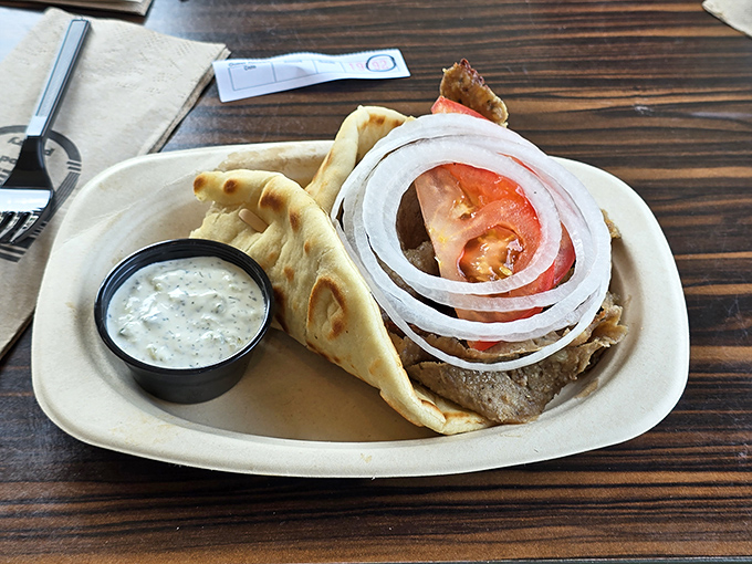 A proper gyro doesn't hide behind gimmicks&mdash;just honest-to-goodness meat, fresh veggies, and tzatziki that makes everything better.