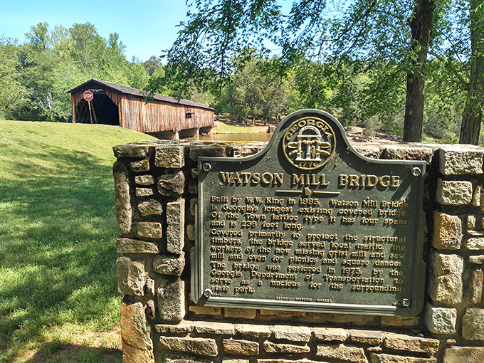 History carved in stone and metal. This marker tells the tale of Washington W. King's masterpiece, standing strong since Grover Cleveland occupied the White House.