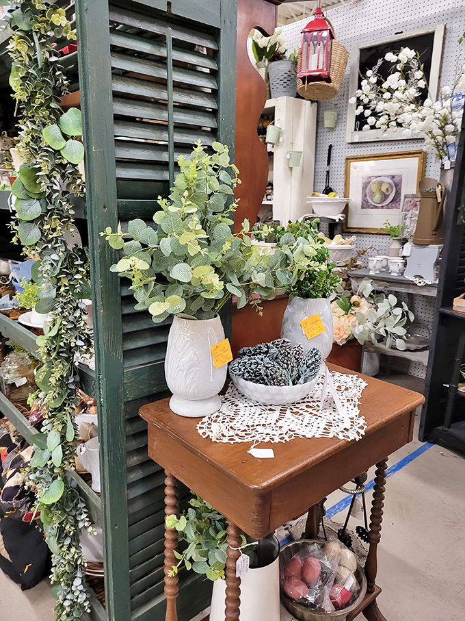 Vintage shutters and artificial greenery create little vignettes of domestic bliss. Martha Stewart would approve, then secretly take notes.