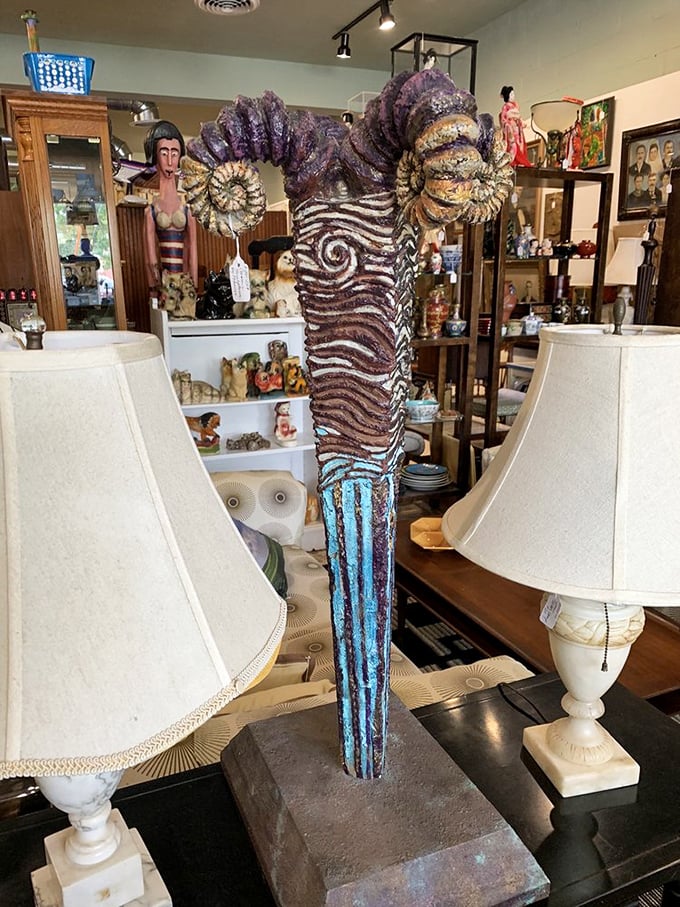 Between two classic table lamps stands what can only be described as the Salvador Dal&iacute; of ceramic art &ndash; whimsical, bold, and utterly conversation-starting.
