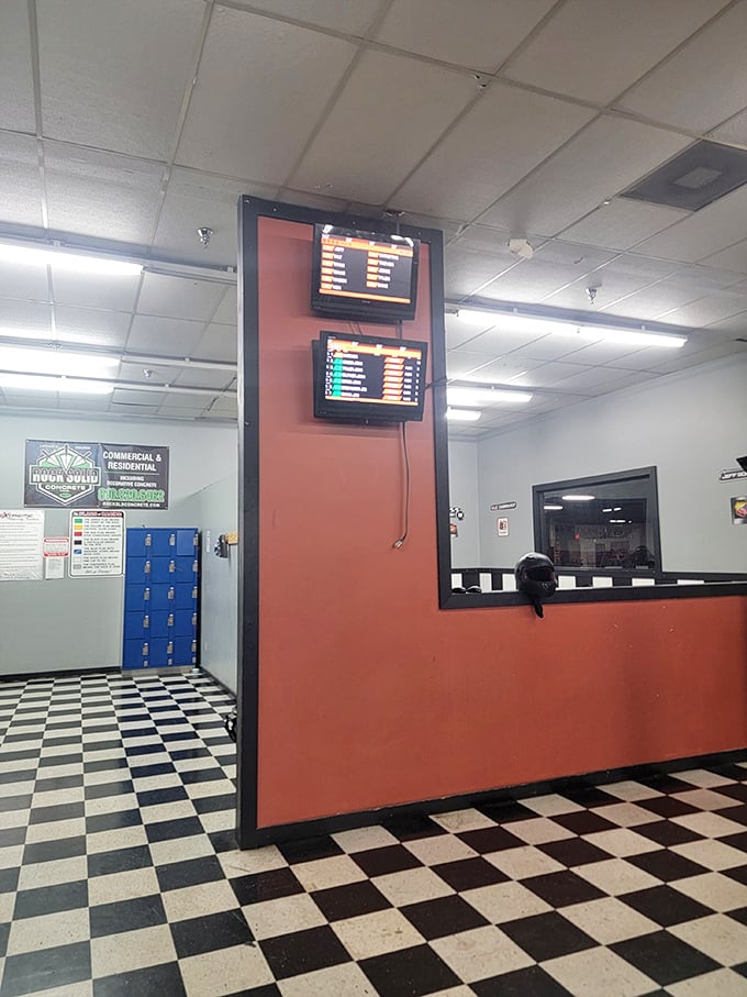 Racing stats illuminate the checkered reception area, where your lap times become either badges of honor or motivation for "just one more race."