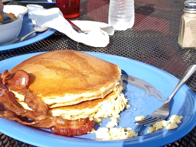 Stack attack! These golden pancakes with perfectly crisped bacon might be the reason morning was invented in the first place.