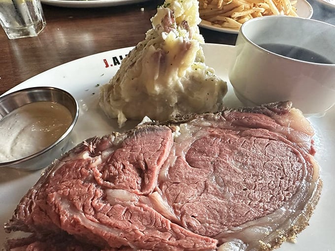 Behold the star of the show! This prime rib arrives like royalty with its smashed potato courtier and au jus attendant.