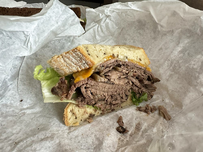 Meat architecture at its finest&mdash;layers of roast beef creating a skyscraper of flavor. This sandwich doesn't just satisfy hunger; it abolishes it completely.