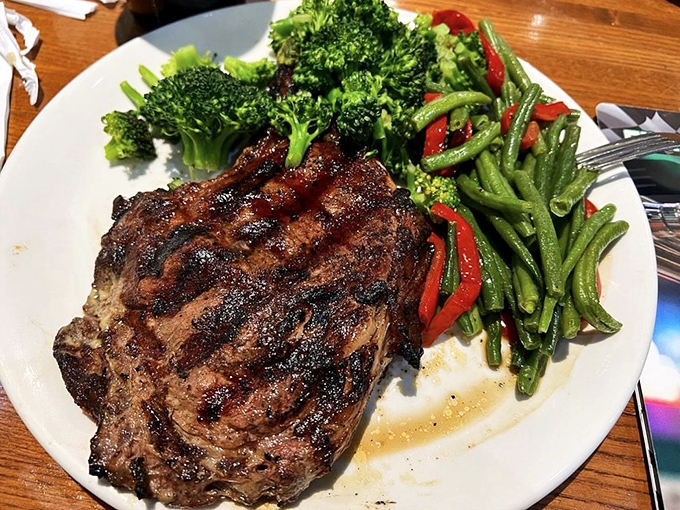 The sirloin steak delivers on its promise: a perfectly seared exterior giving way to a tender interior that makes you wonder why you'd ever need a steakhouse.