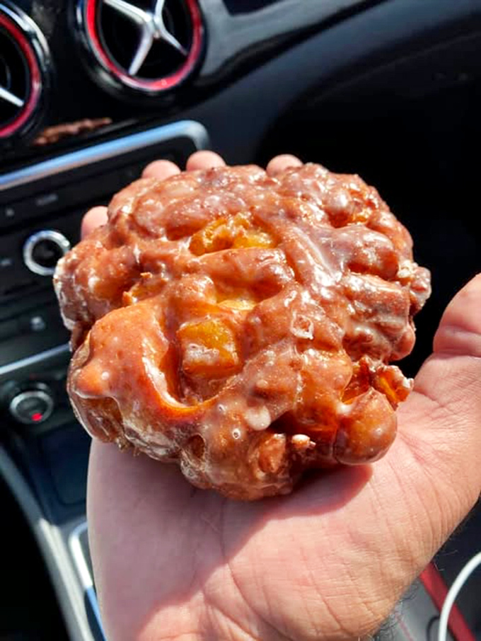 That's not just an apple fritter&mdash;it's edible architecture. Note the perfect glaze-to-dough ratio that makes car dashboards the best dining tables.