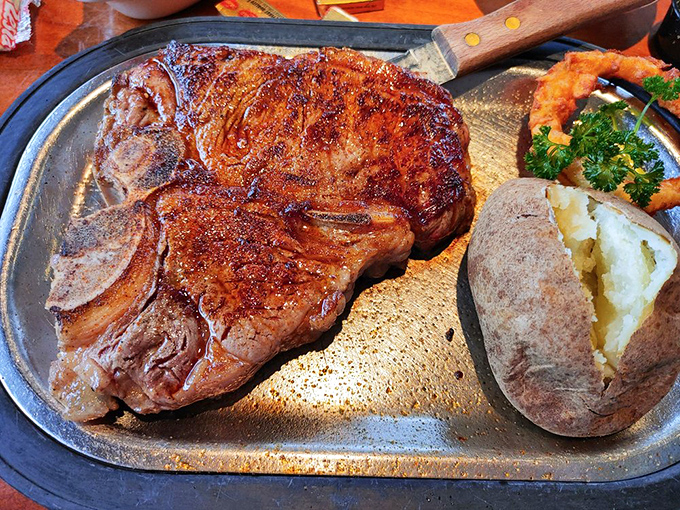 The T-bone arrives like a meaty work of art, with a side of broccoli playing the humble supporting role it was born to play.