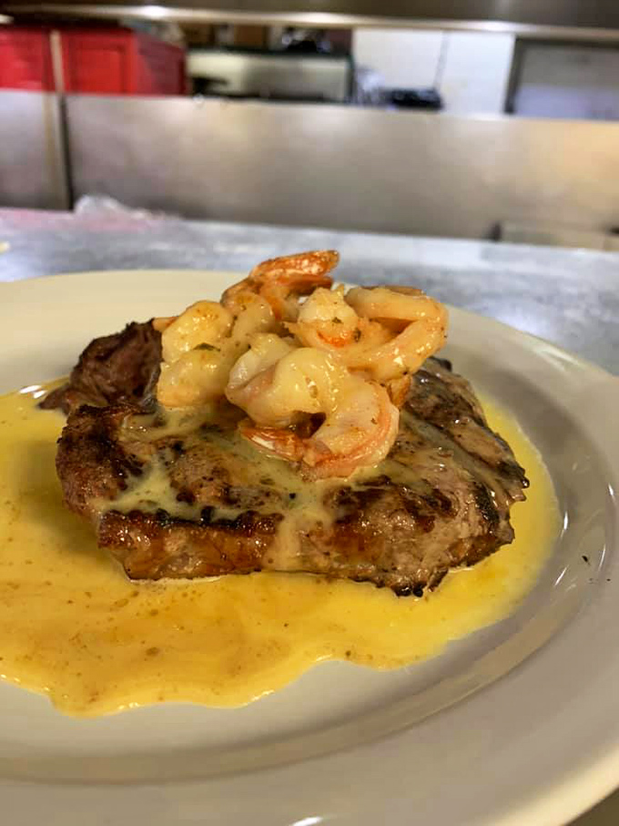 This isn't just a steak&mdash;it's a butter-bathed masterpiece topped with succulent shrimp that might make you forget your table manners entirely.
