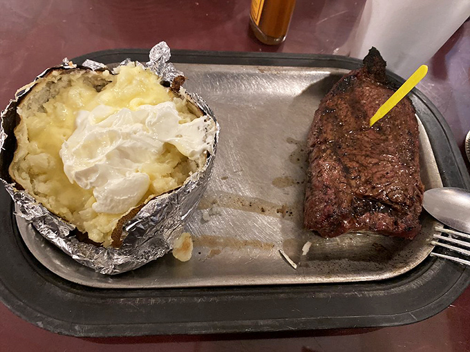 That sirloin has the kind of char that makes carnivores weak at the knees, while the potato stands ready for its supporting role.