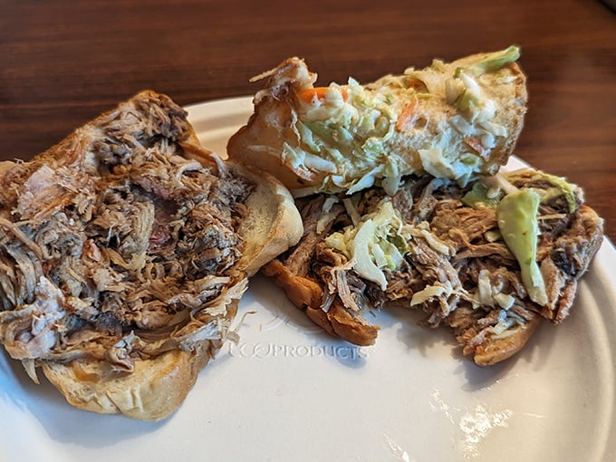 Barbecue nirvana on a plate. Tender pulled pork piled high on white bread, the smoky meat speaking eloquently of patience and tradition.