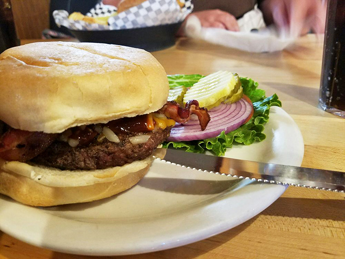 This isn't just a burger; it's edible architecture. The perfect stack of beef, bacon, cheese, and veggies that makes fancy $28 restaurant burgers weep with inadequacy.