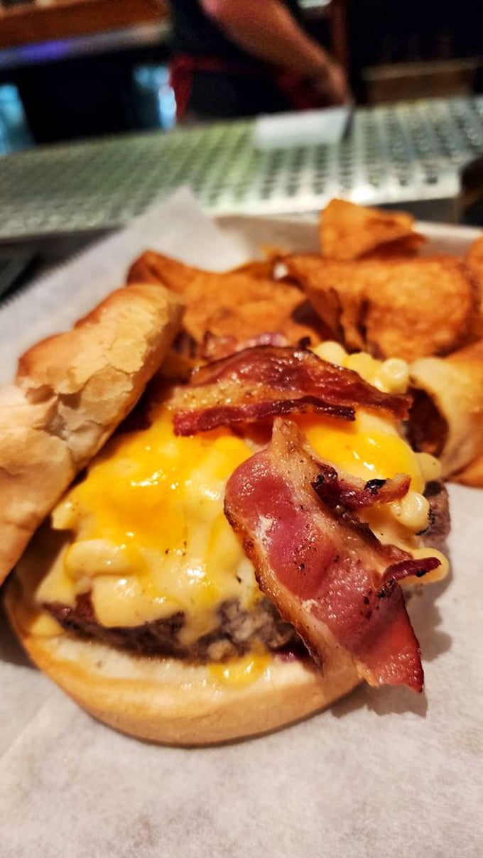 The classic bacon cheeseburger elevated to art form—where melted cheese cascades over crispy bacon in a dance of savory perfection.