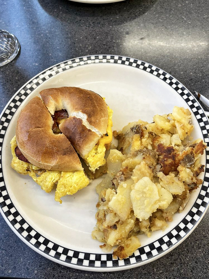 This breakfast sandwich doesn't need a fancy pedigree&mdash;just a perfectly toasted bagel, fluffy eggs, and home fries that could make a potato farmer weep with pride.