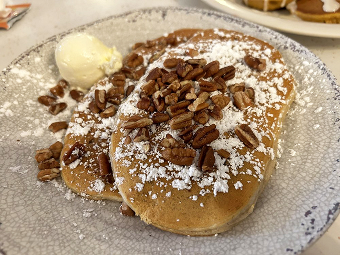 These pecan pancakes aren't just breakfast&mdash;they're an edible Southern hug, complete with powdered sugar snow and a butter crown fit for royalty.