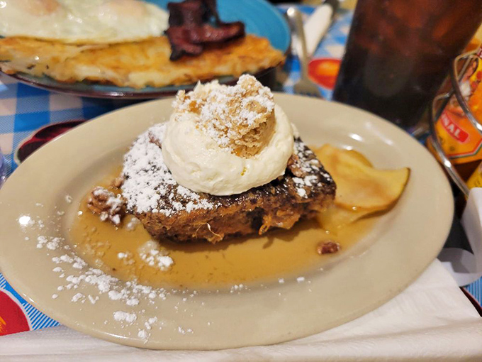 Banana bread French toast that makes ordinary breakfast seem like a sad desk lunch. That scoop of butter is melting almost as fast as my resolve.