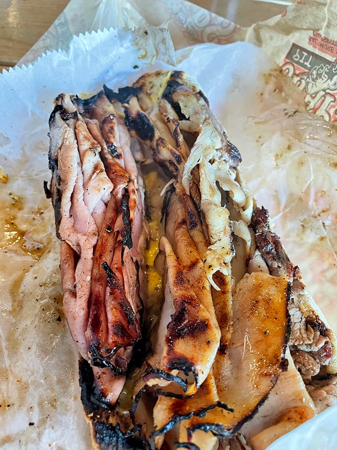 Behold the smoke ring &ndash; that pinkish edge is nature's way of saying "this meat has been loved." Tender, smoky perfection awaits.