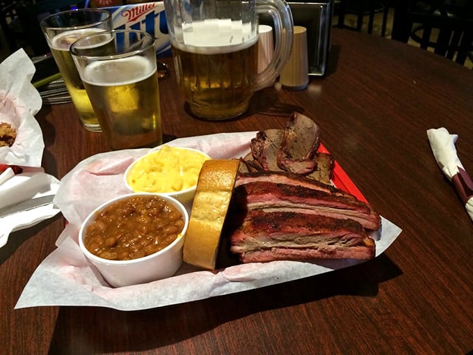 Brisket with that perfect pink smoke ring sits alongside beans and mac and cheese&mdash;a holy trinity of comfort that speaks to your soul.