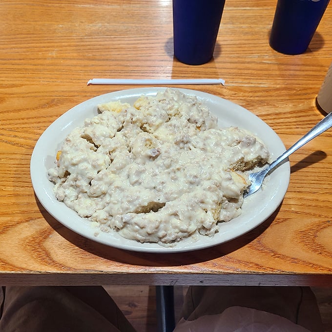 Biscuits and gravy: where pepper-speckled cream sauce cascades over fluffy carbs like a comfort food Niagara Falls. Worth every delicious calorie.