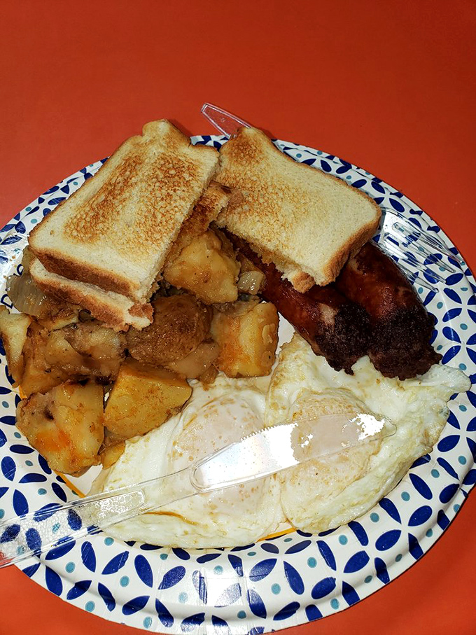 Breakfast perfection doesn't need fancy plating. Golden home fries, perfectly cooked eggs, and toast ready for yolk-dipping adventures.