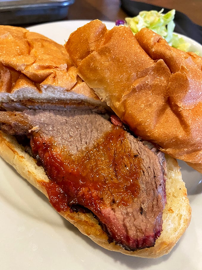 Brisket sandwich perfection &ndash; that bark, that smoke ring! The kind of sandwich that makes conversation impossible except for appreciative mumbling.