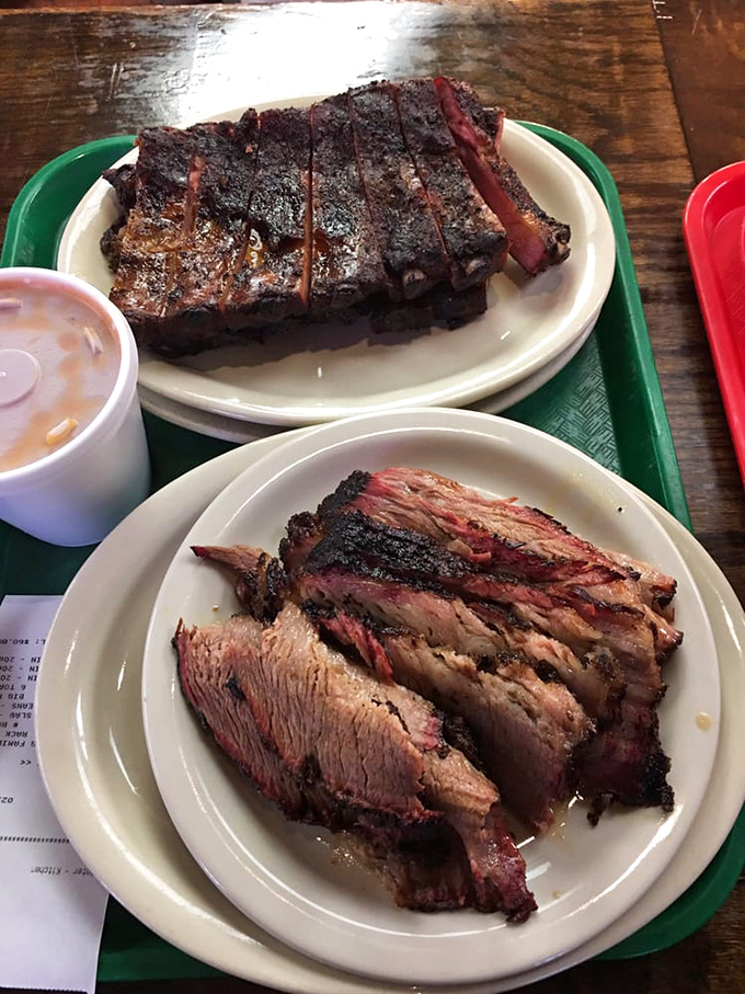 Behold the bark! These ribs and brisket showcase that perfect smoke ring &ndash; the pink halo that whispers sweet nothings about long hours in the smoker.
