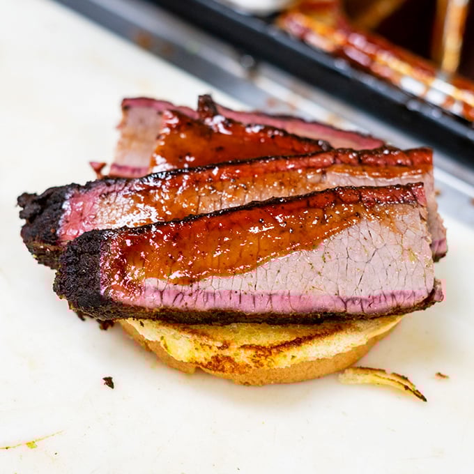 That perfect pink smoke ring isn't just for show&mdash;it's the barbecue equivalent of a Michelin star, signaling hours of patient smoking and expert timing.