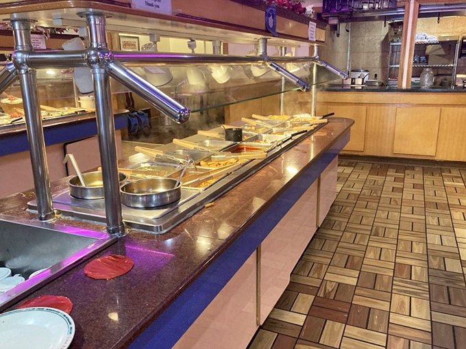 Steam rises from the buffet line like a culinary fog, promising a journey through Chinese-American classics that never disappoints.