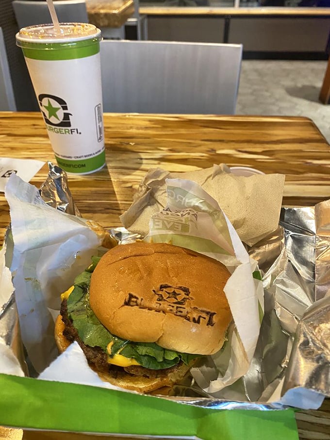 That branded bun isn't just showing off&mdash;it's BurgerFi's way of signing their masterpiece before you demolish it with gleeful abandon.