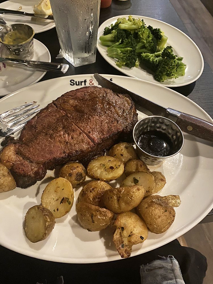 A perfectly seared steak flanked by golden potatoes and vibrant broccoli&mdash;proof that sometimes the simplest trio makes the most beautiful music.