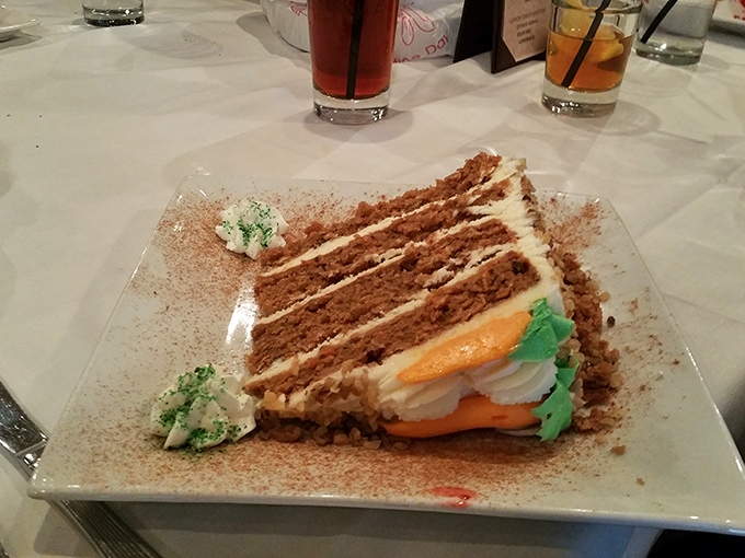 Layer upon layer of spiced perfection, this carrot cake slice isn't just dessert&mdash;it's an edible architecture masterpiece with frosting mortar.