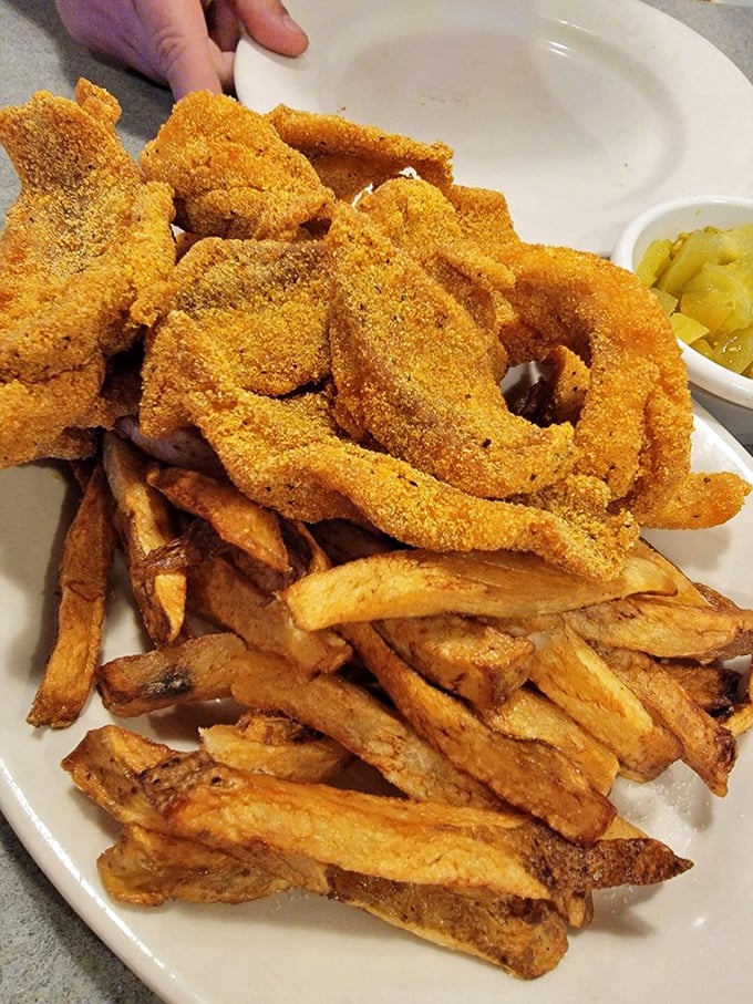 Golden-fried catfish that crackles with each bite, paired with hand-cut fries&mdash;proof that simplicity, when done right, is culinary poetry.