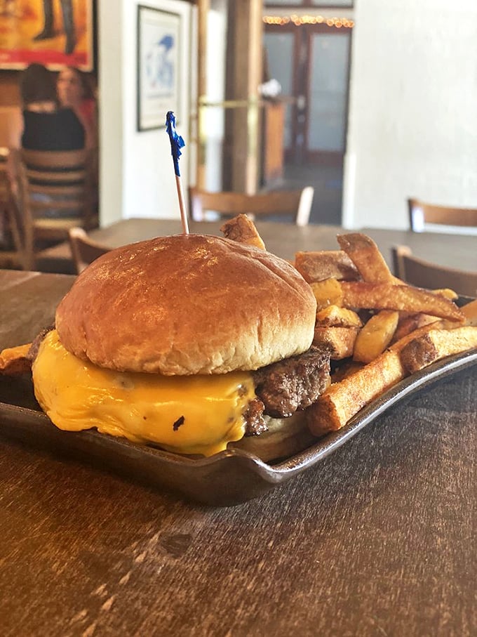 Simplicity perfected: a golden-hued cheeseburger with house-cut fries that reminds us why classics become classics. Sometimes the straightforward approach hits all the right notes.