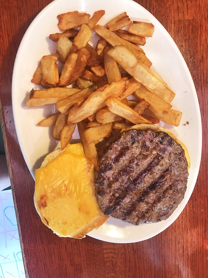 A burger that means business. The perfect char, the melty cheese&mdash;this isn't just lunch, it's a commitment to excellence.