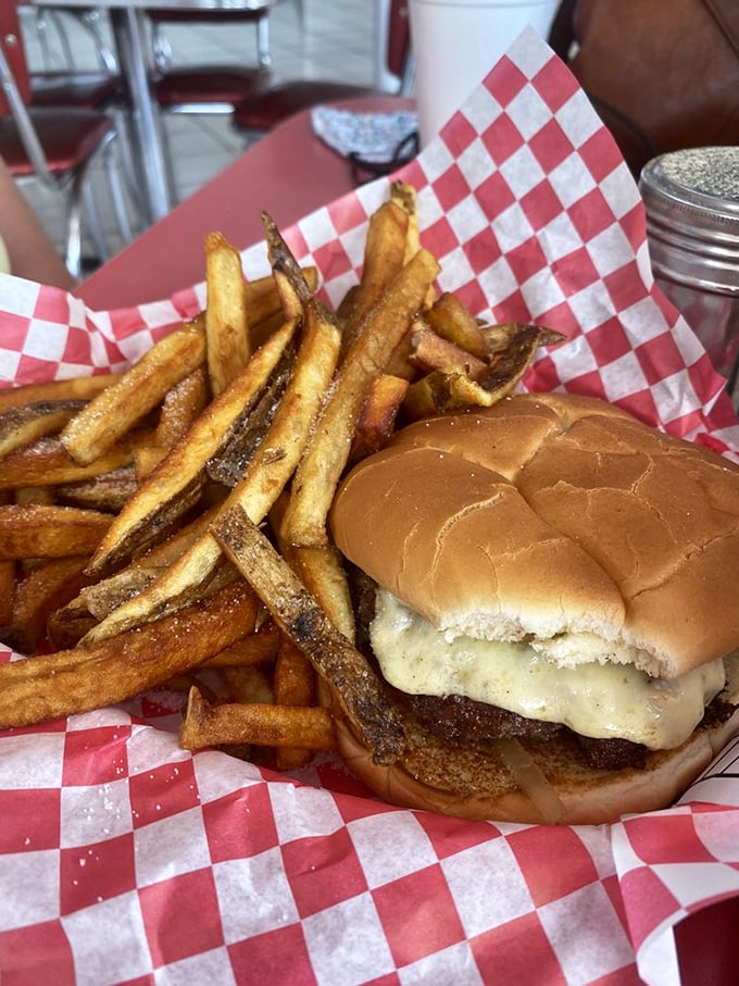 Simplicity perfected: A classic cheeseburger with hand-cut fries that would make even the most sophisticated food critic weep with joy.