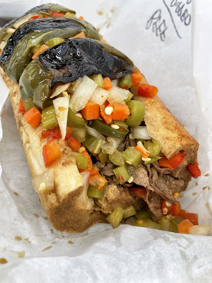The legendary Chicago Italian Beef in all its glory. That giardiniera topping isn't just garnish&mdash;it's the exclamation point on a meaty sentence.