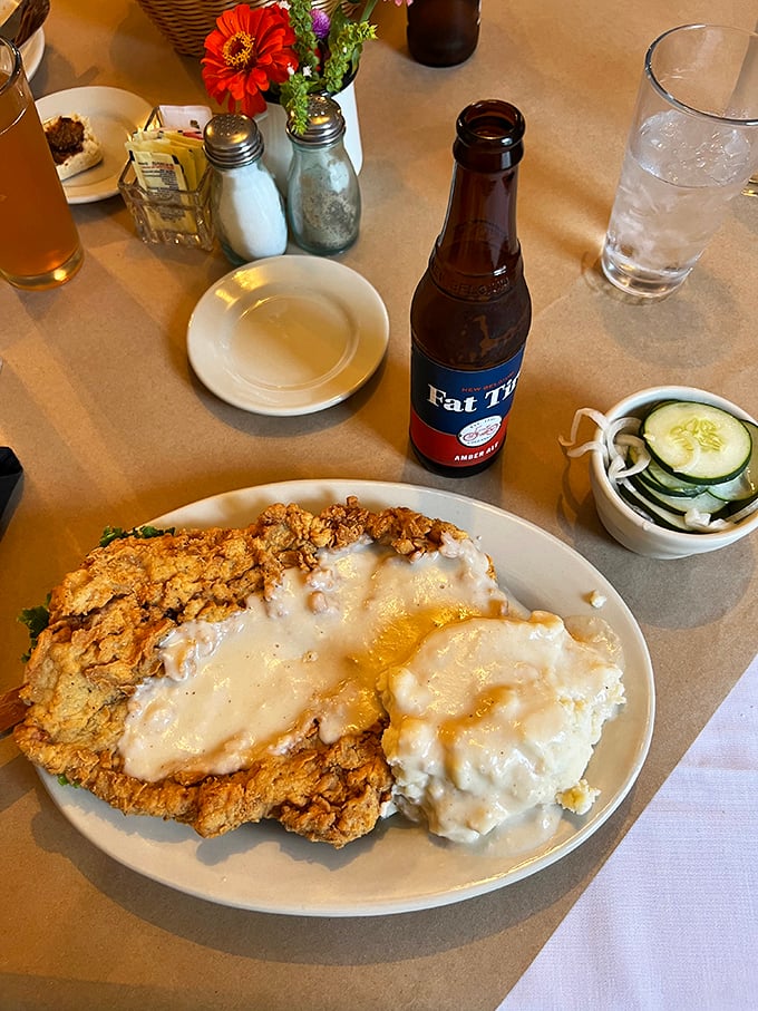 Behold the country-fried pork tenderloin smothered in creamy white gravy &ndash; a plate so good it makes you want to hug the chef and adopt Missouri citizenship.
